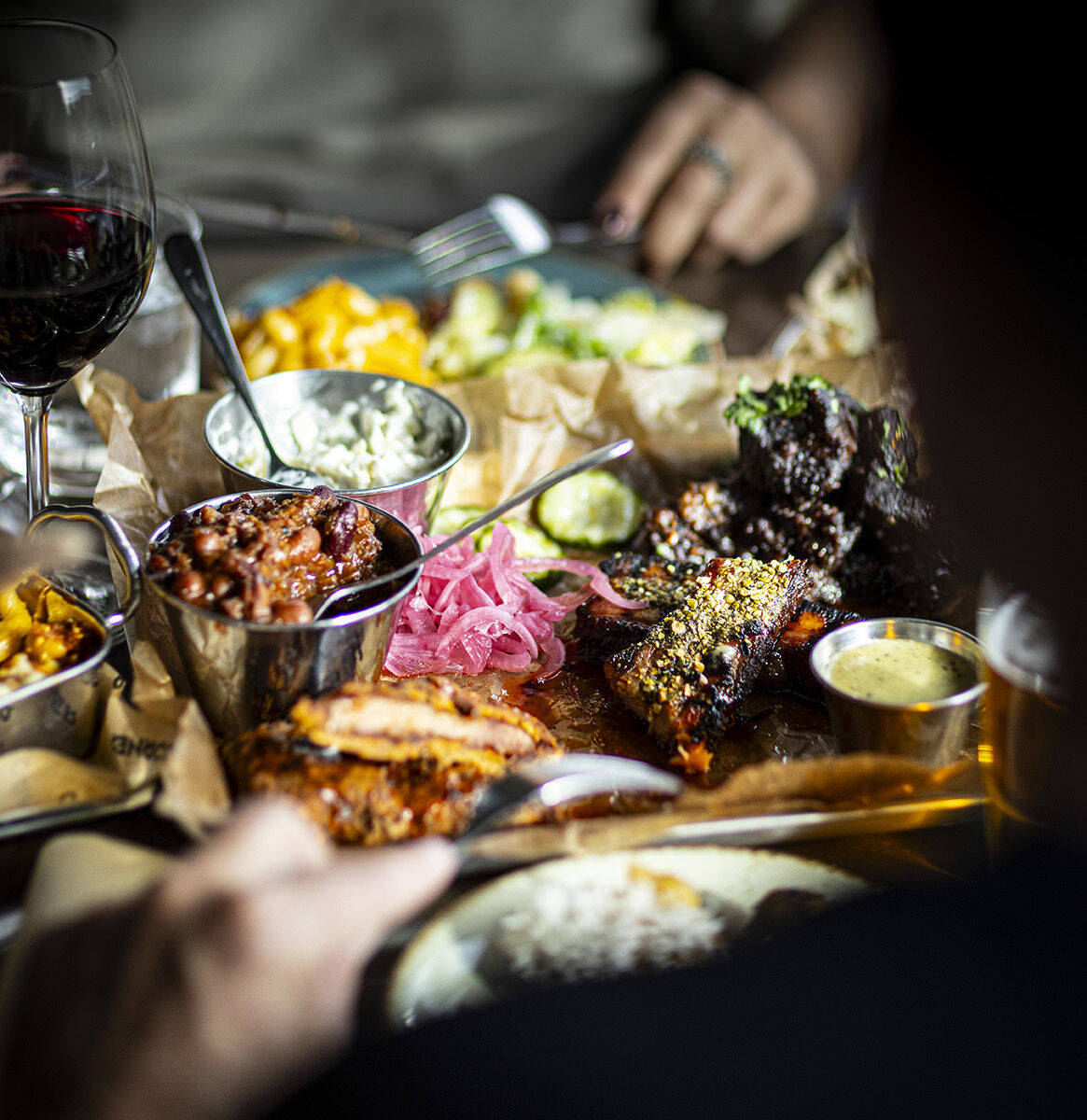 Meny på restaurang Corner – Fueled by Holy Smoke BBQ